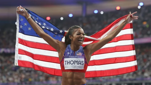 Thomas sweeps to Olympic sprint gold, boxer in row moves into final ...