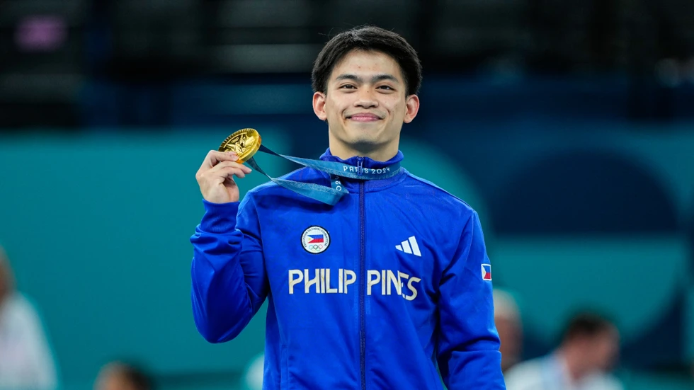 'Overwhelmed' Yulo wins historic gymnastics Olympic gold for ...