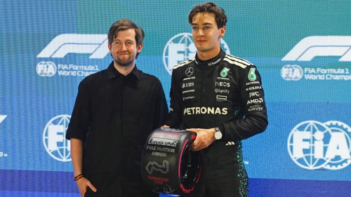 Russell takes pole position for Singapore GP as McLaren struggle ...