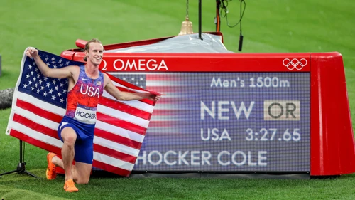 Thomas takes Olympic 200m, Hocker streaks to shock 1500m victory ...